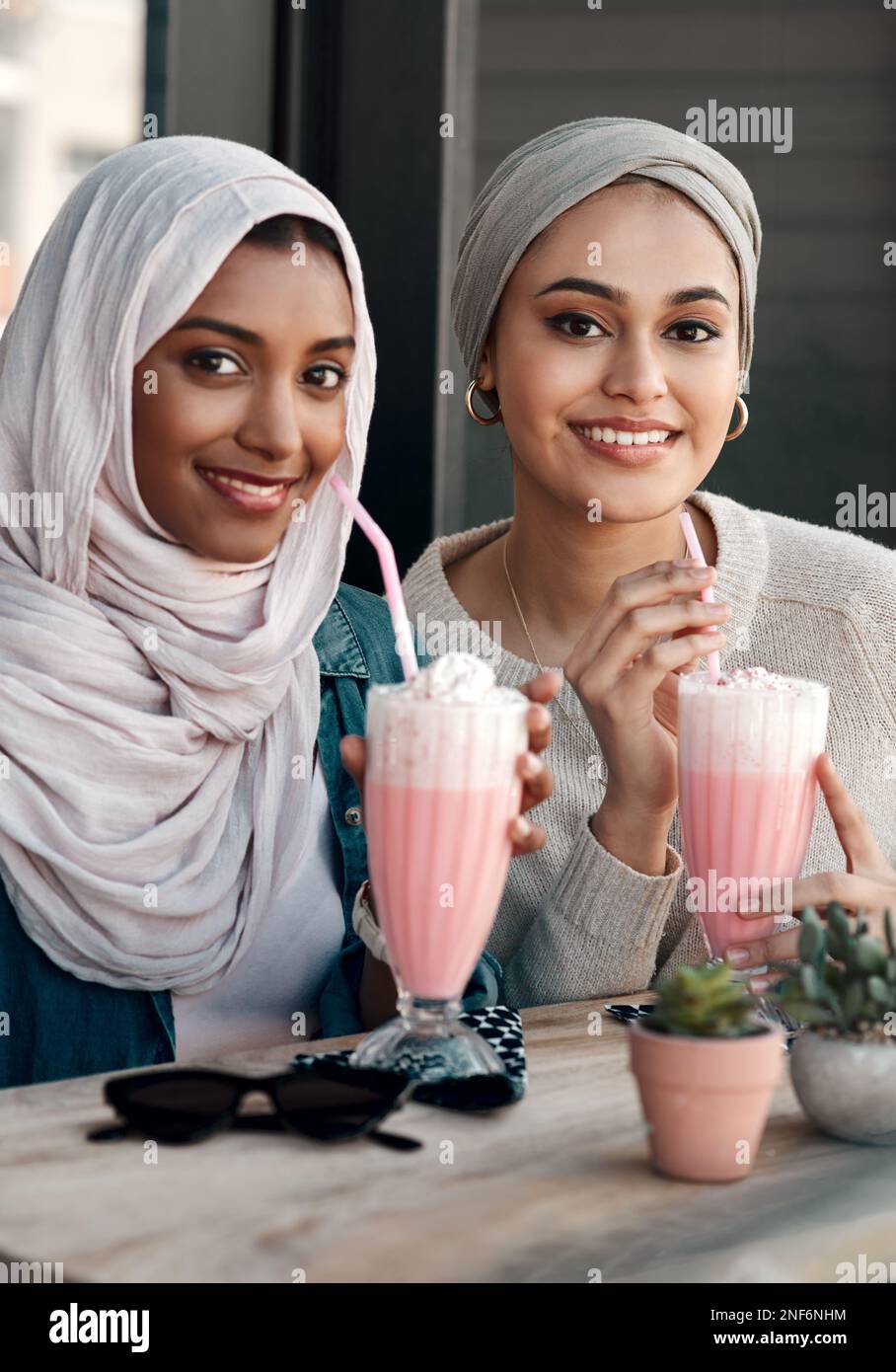 This is the best cafe on earth. Cropped portrait of two affectionate ...