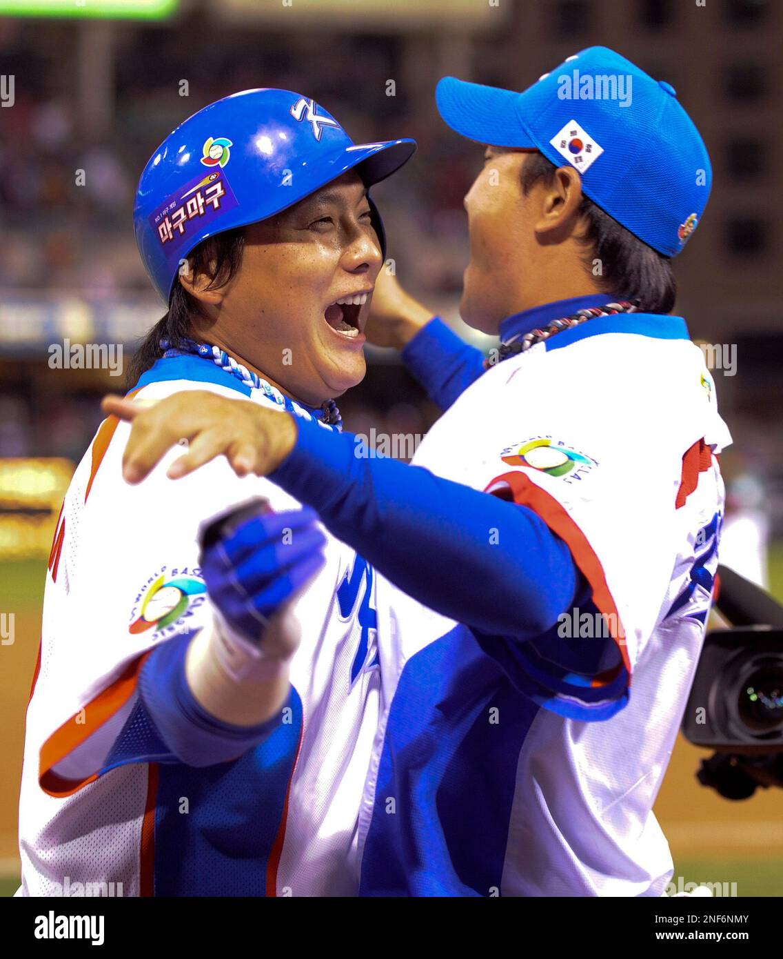 South Korea's Kim Tae Kyun, right, and teammate Bong Jung Keun ...