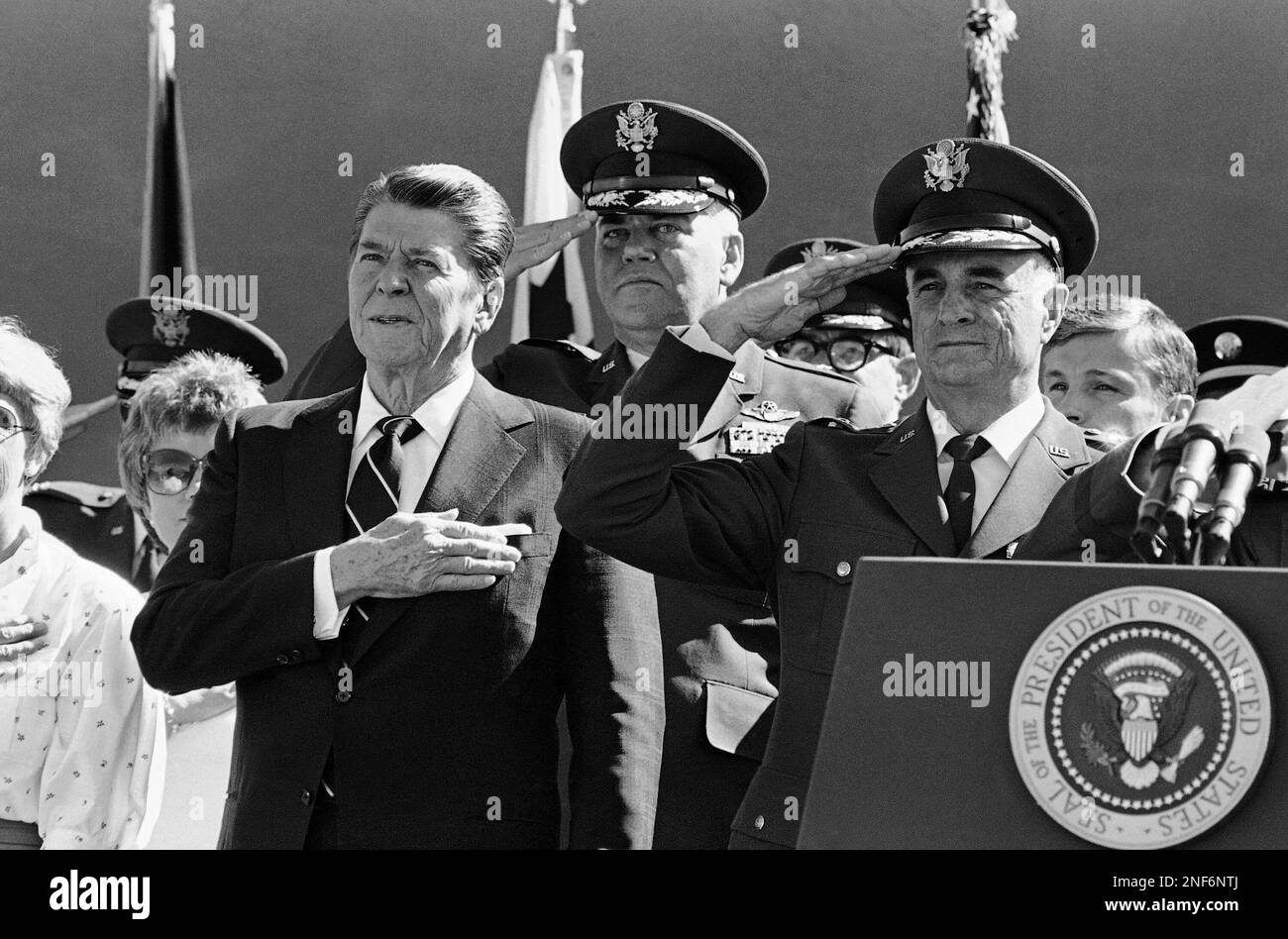 President Ronald Reagan puts his hand to his heart as Lt. Gen. Winfield ...