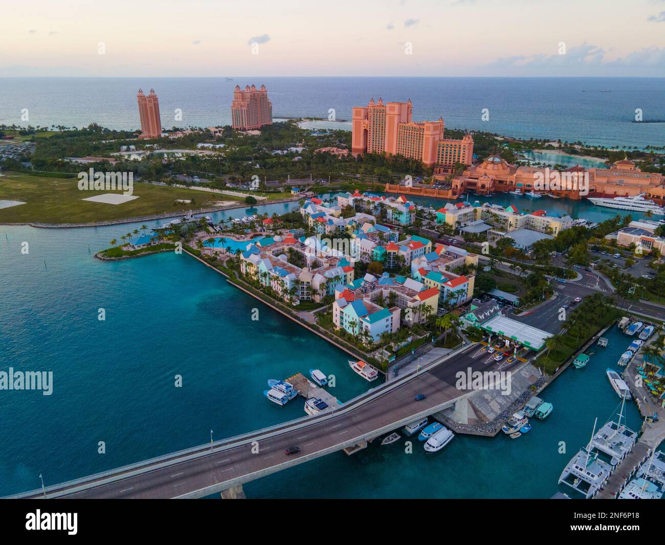 Harborside Villas aerial view at sunset with Atlantis Hotel at the ...