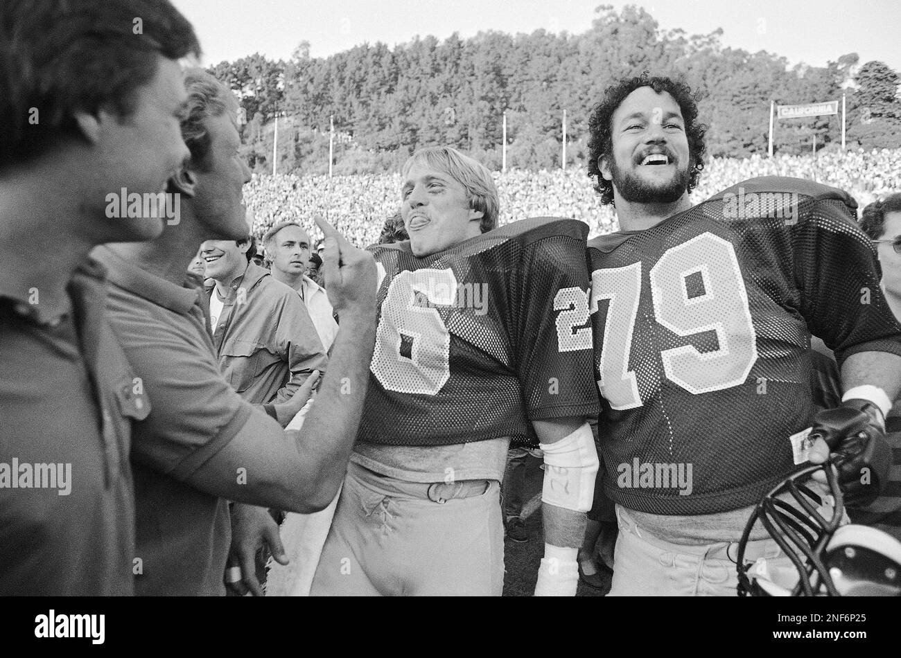 Cal’s Kevin Moen center (26), and Ricardo Stelzmiller (79) are all ...