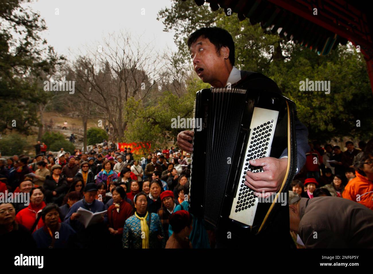 Chinese elderly sing folk songs in Coal Mountain Park in Beijing, China ...