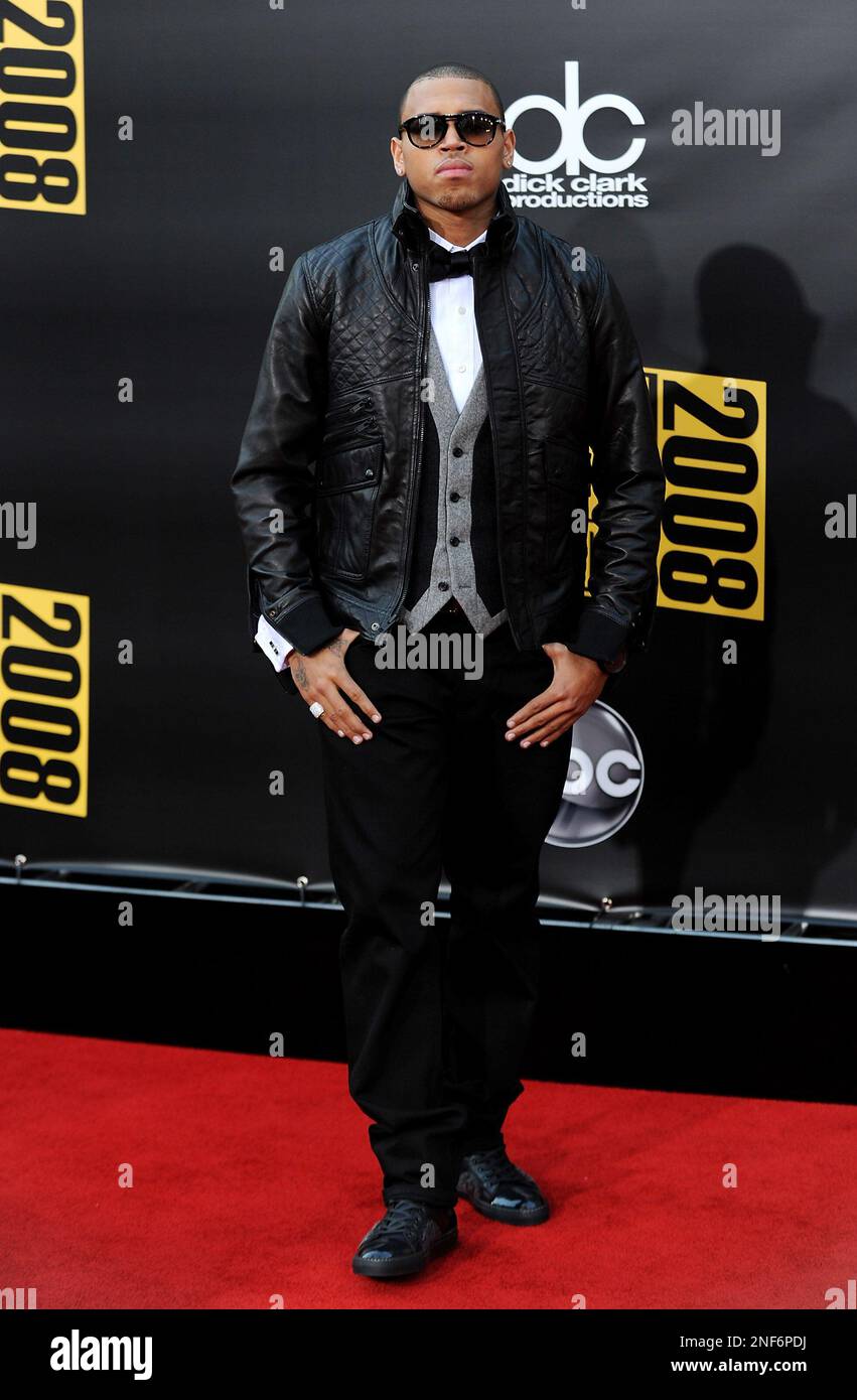 Singer Chris Brown arrives at the American Music Awards in Los Angeles ...