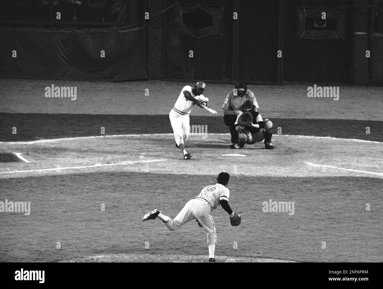 Joe Morgan, Cincinnati, gets a hit, left, driving in the winning run ...