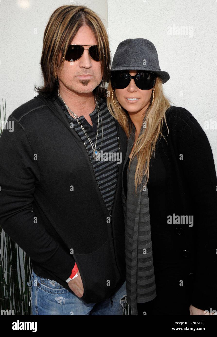 Singer and actor Billy Ray Cyrus, left, and his wife, Leticia Cyrus ...