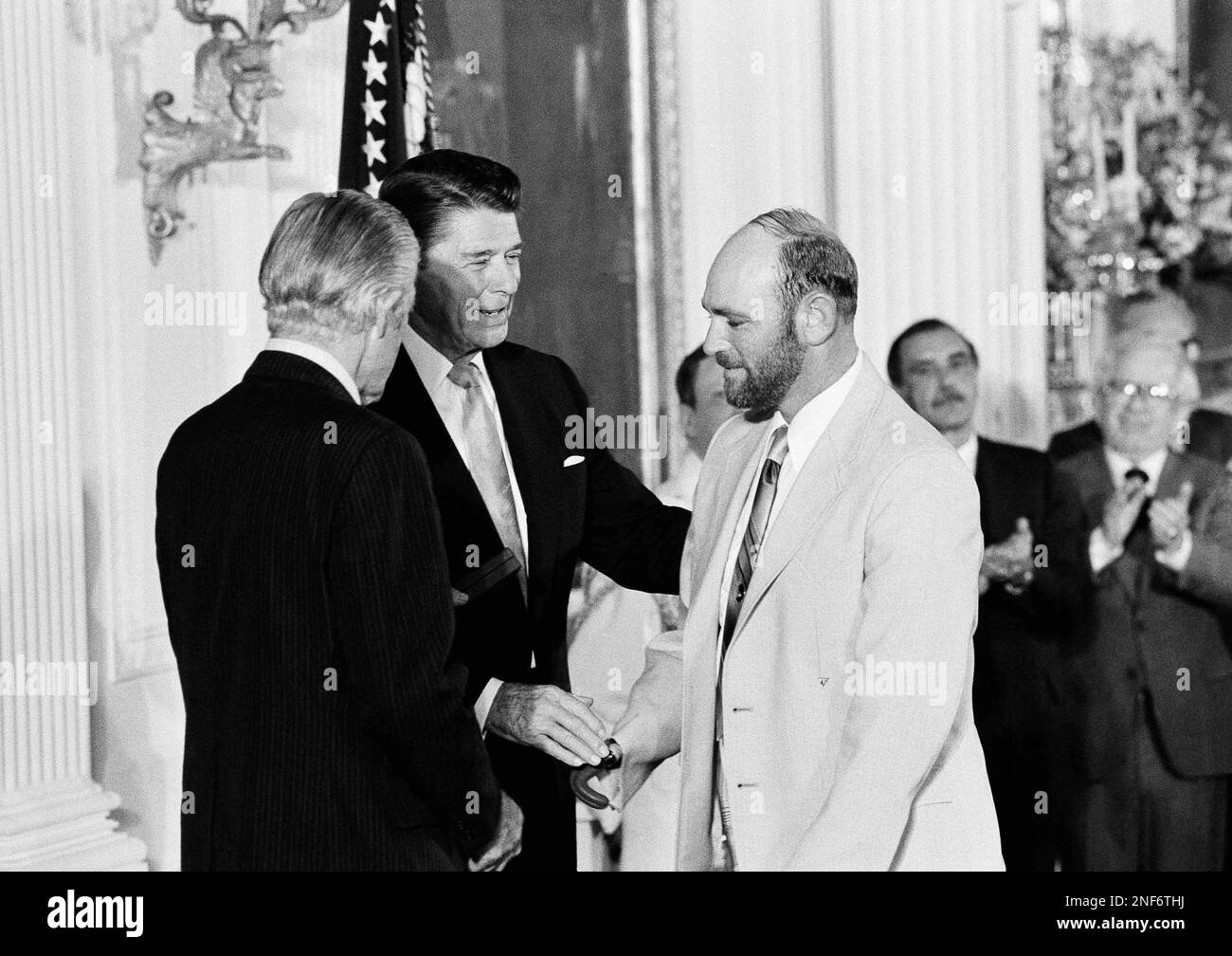 Tom Rader of Dos Palos, California, right, talks with President Ronald ...