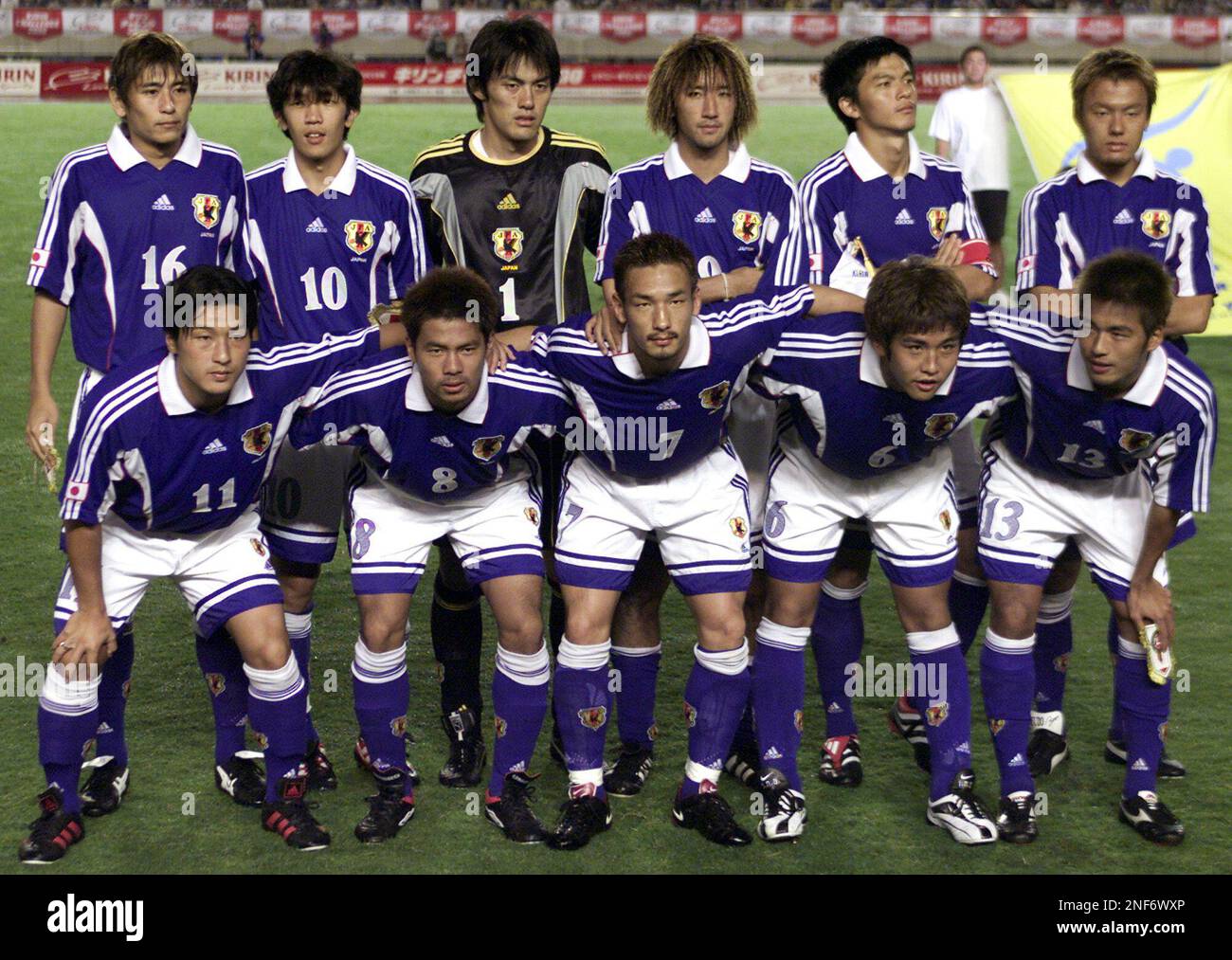 Japan's national soccer team member for Sydney Olympics pose for a team ...