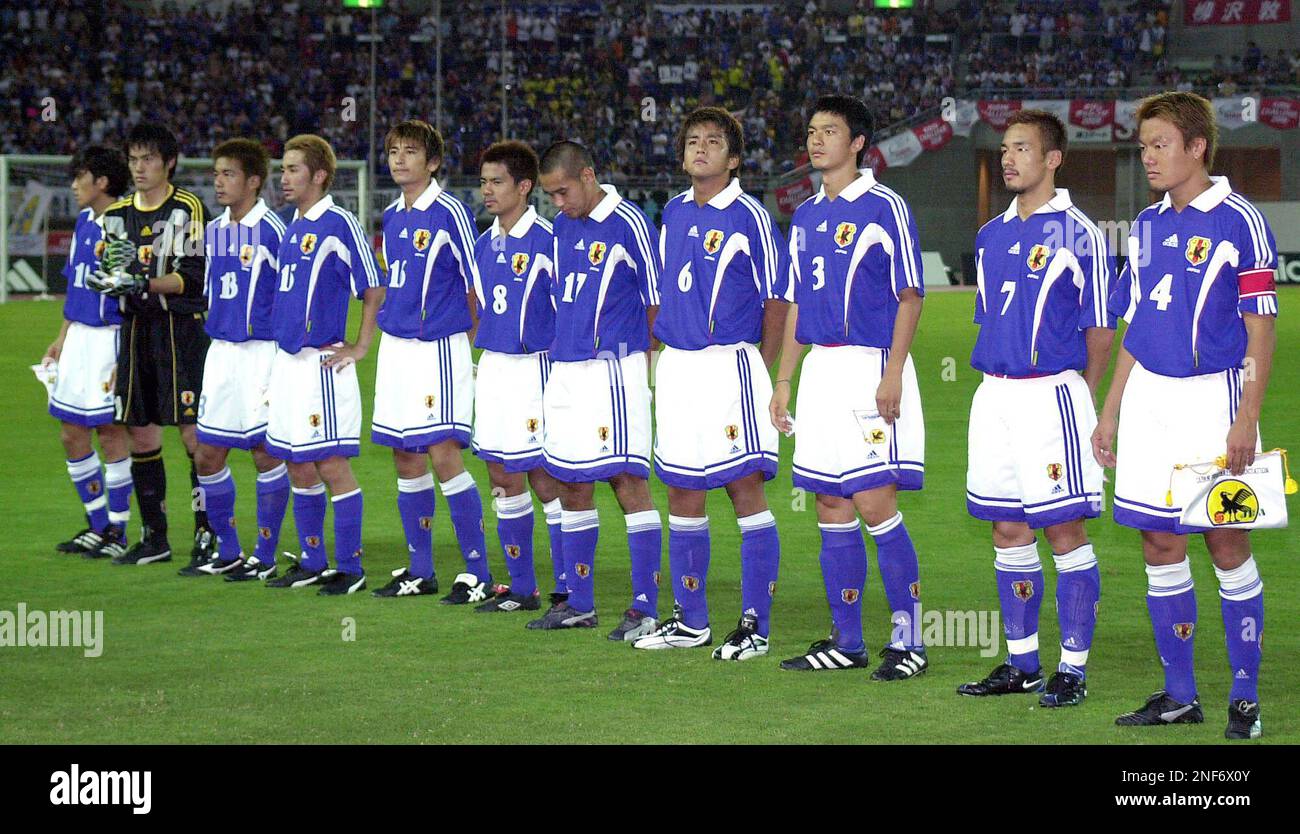 Japan's national soccer team member for Sydney Olympics pose for a team ...