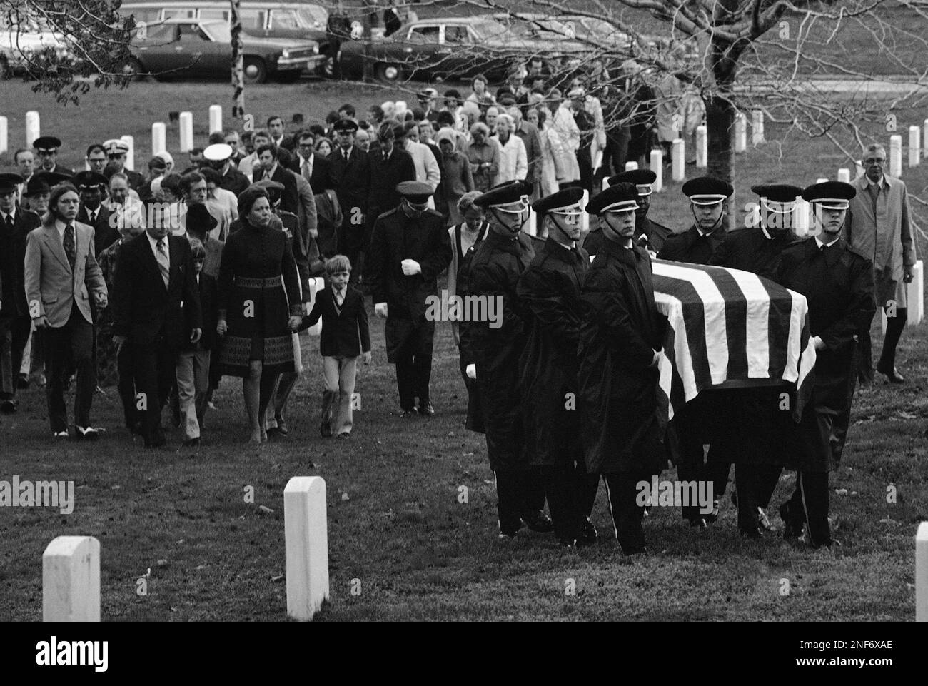Mrs. Evelyn Grubb, of Colonial Heights, Va., left, follows her husband ...