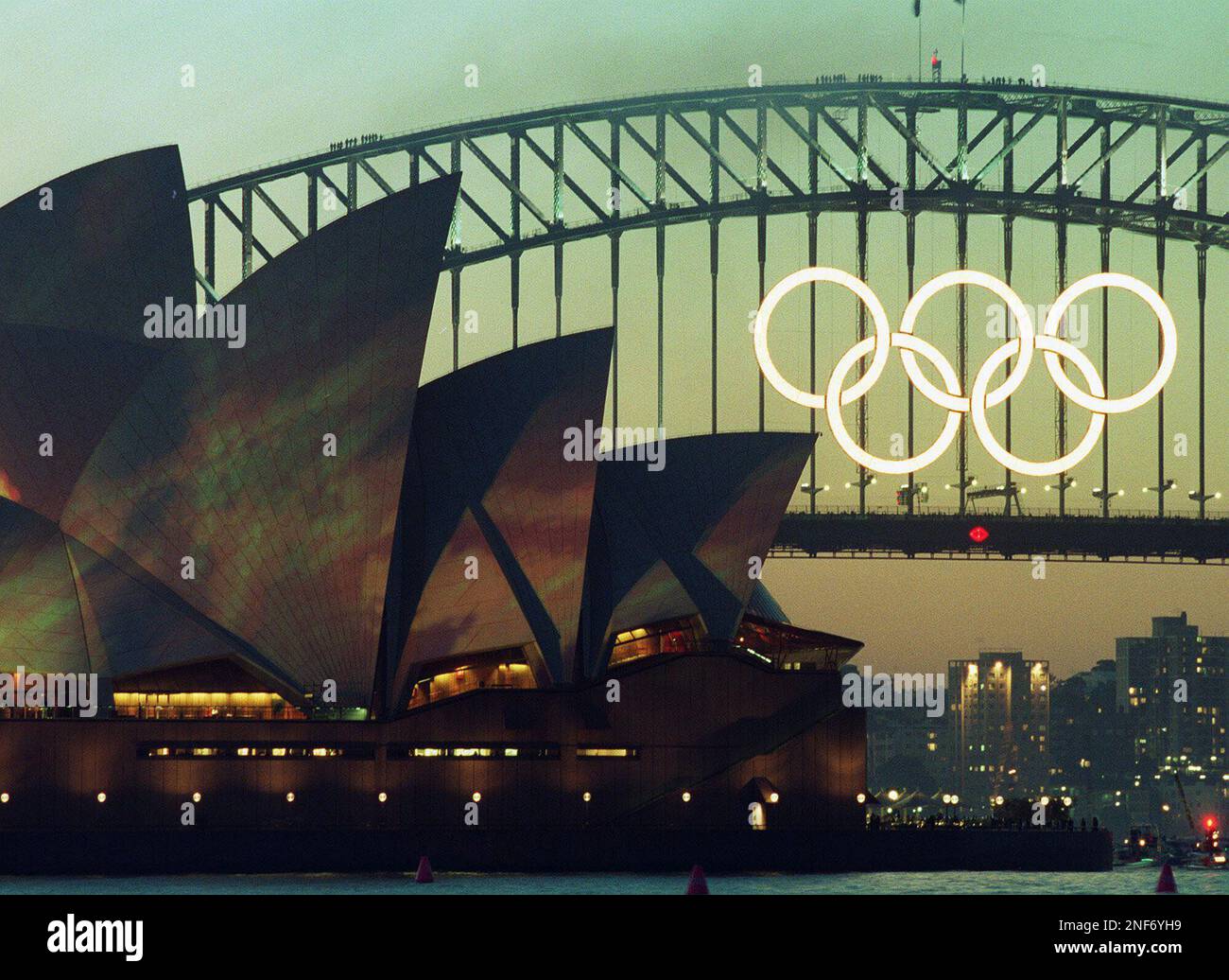 The famous Sydney Harbour Bridge with the Olympic rings and the Opera ...