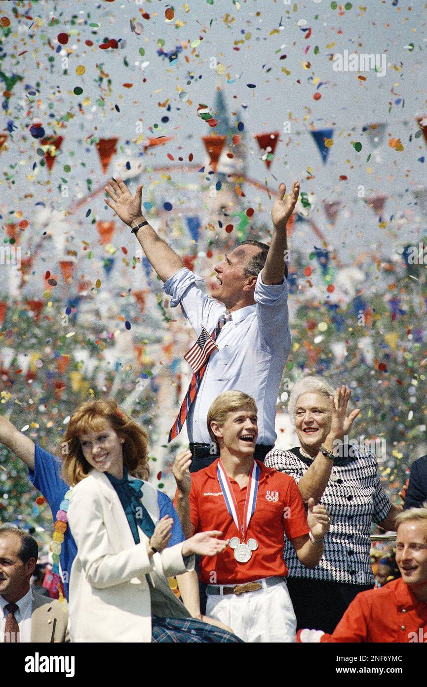 Vice President George H.W. Bush acknowledges the cheers from the crowd ...