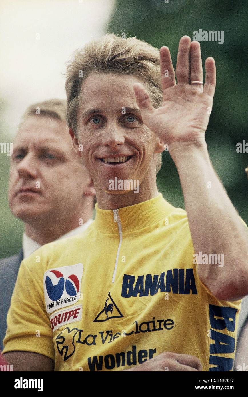 Greg LeMond of the United States waves to cheerleaders after winning ...