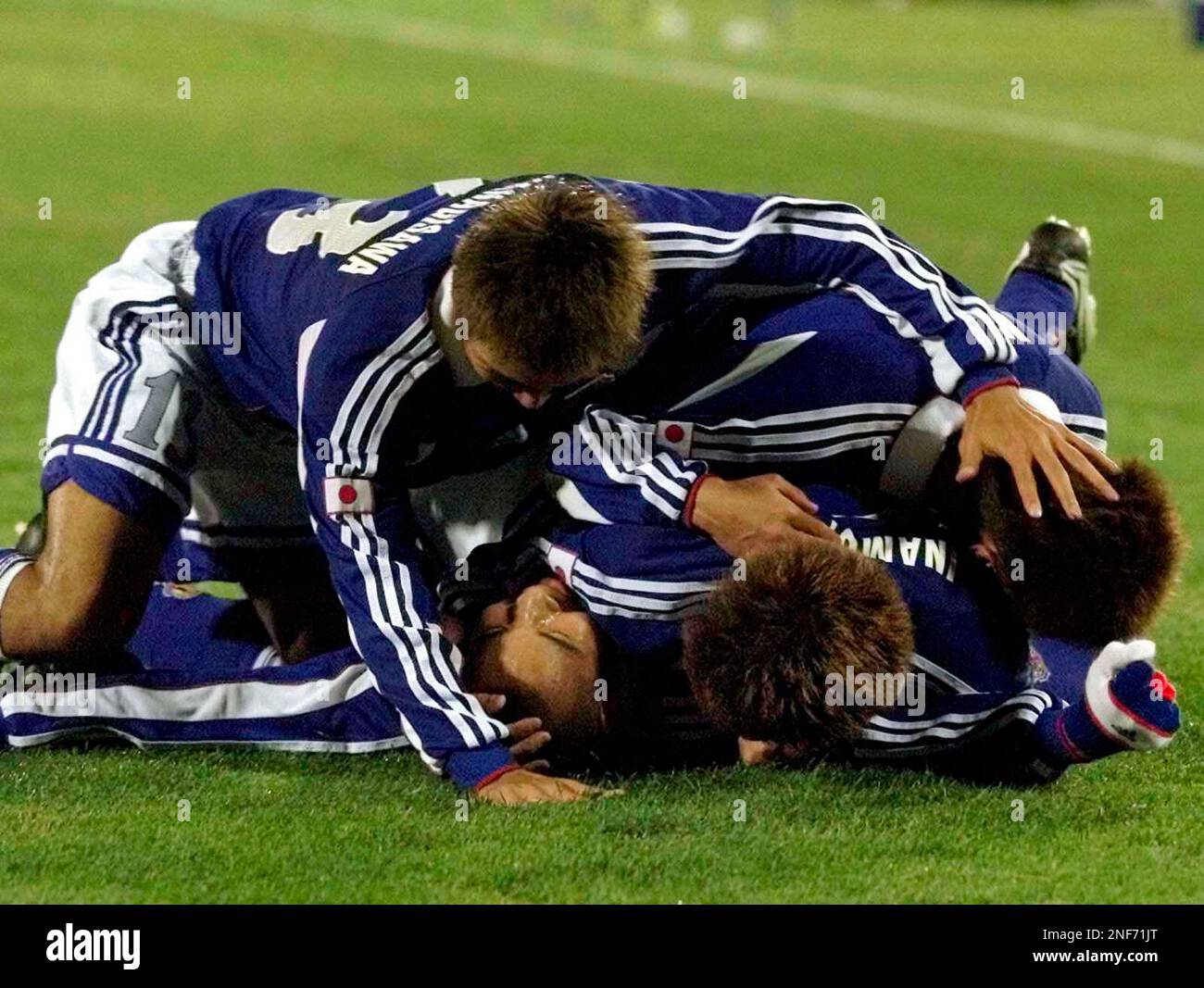Japan's players celebrate after Naohiro Takahara scored a goal against ...