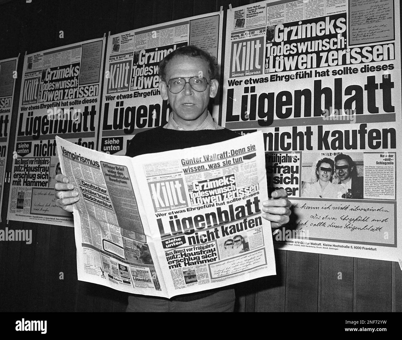 Guenter Wallraff, West German writer, based in Cologne, presents his first copy of his ...