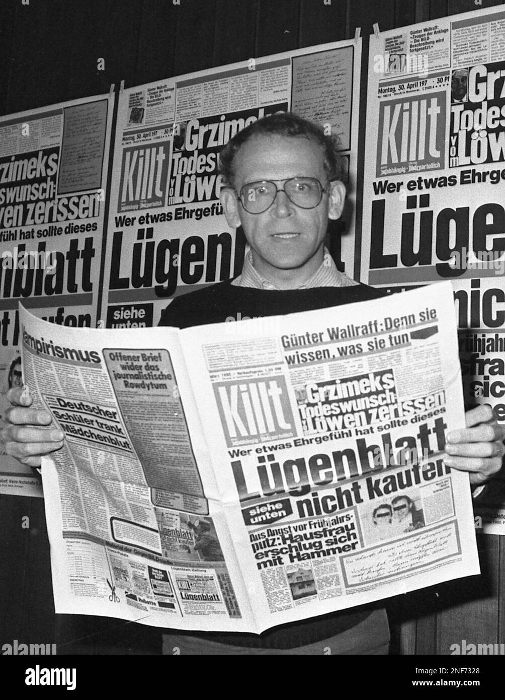 Guenter Wallraff, West German writer, based in Cologne, presents his first copy of his ...