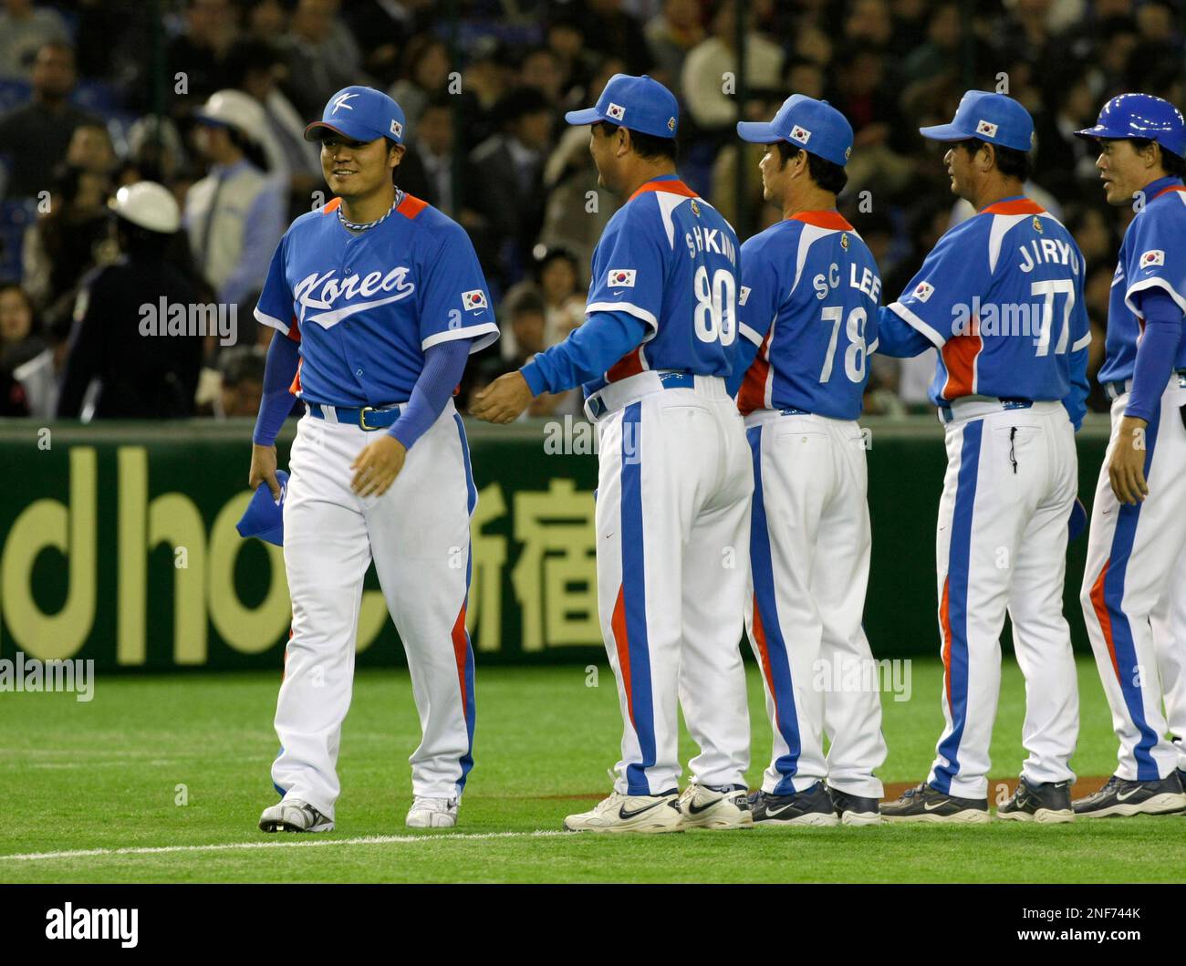 Team South Korea designated hitter Choo Shin-soo, left, of the ...
