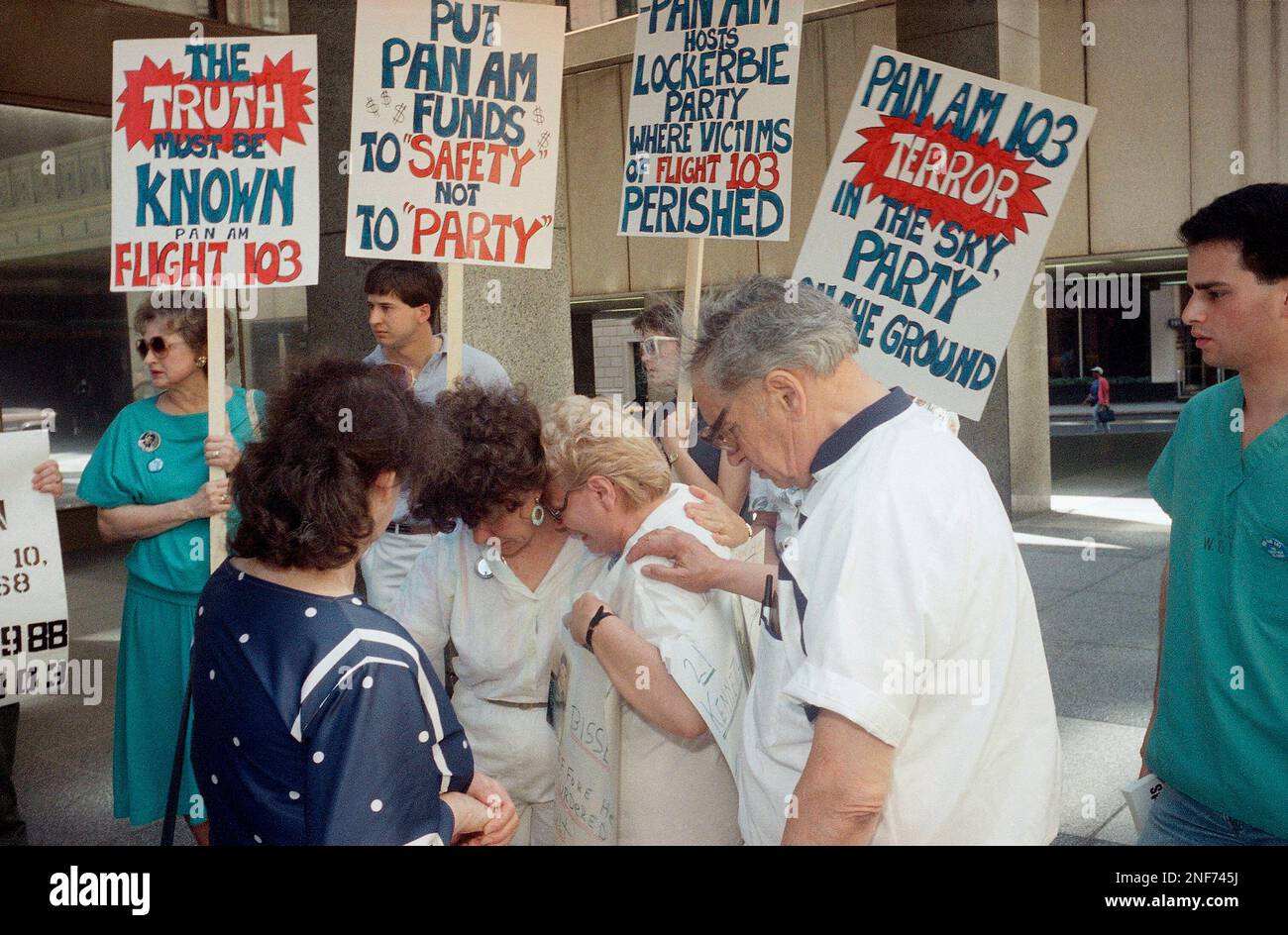 Florence Bissett, second from right, whose 21-year-old son, Kenneth ...