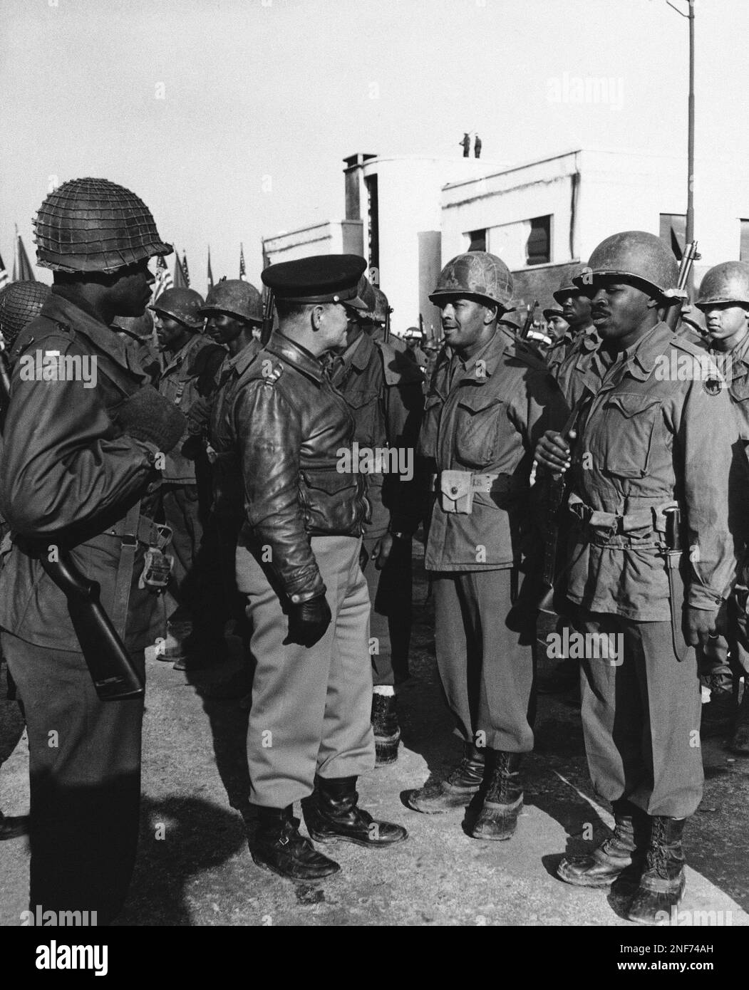 Lt. General Lucian K. Truscott, Jr. inspects Black troops, Jan. 9, 1945 ...