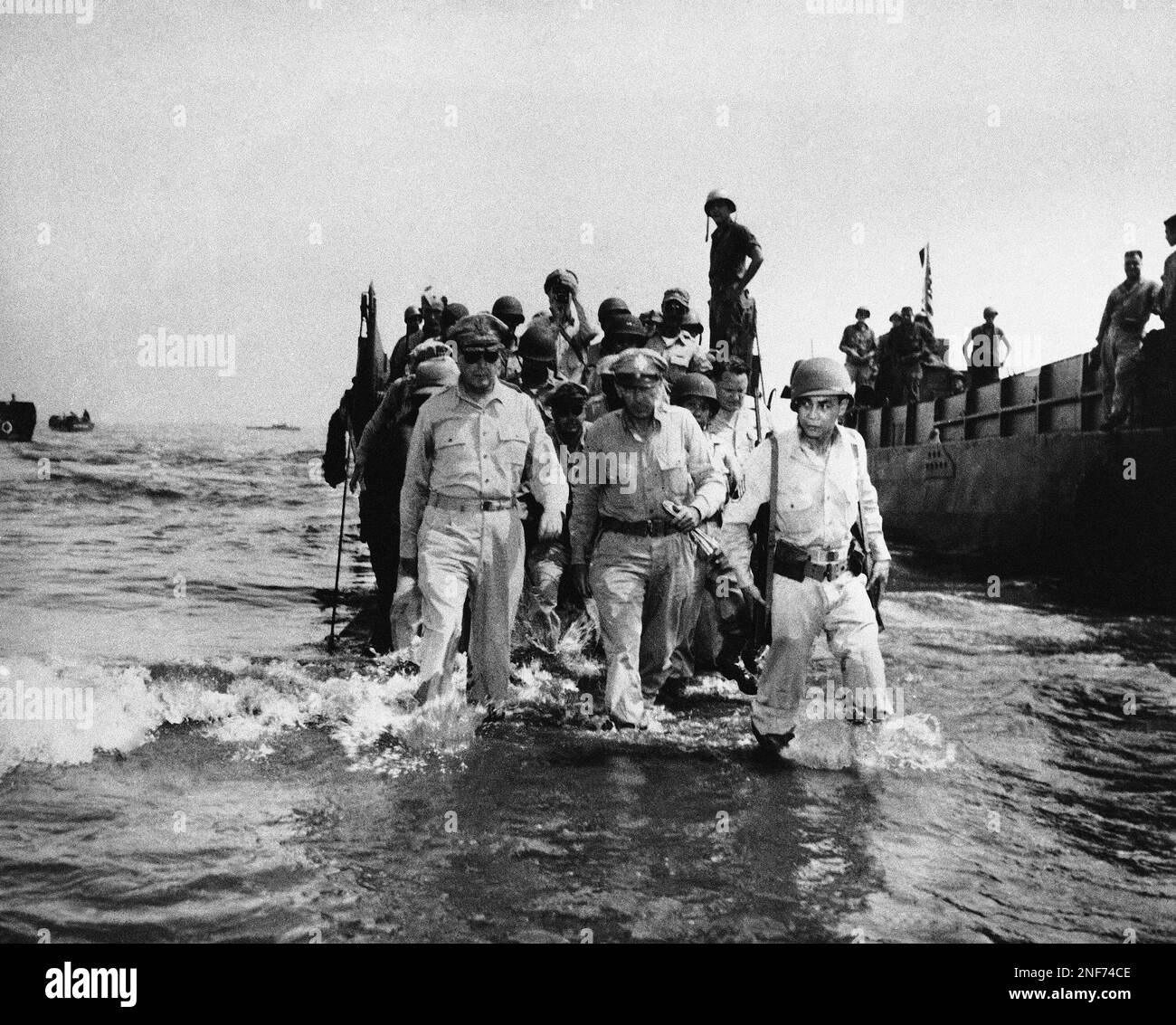 General Douglas Macarthur and a group of U.S. Army and Philippine ...