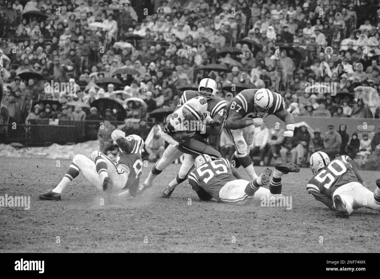 Walter Roberts of the New Orleans Saints runs into a wall of Baltimore ...