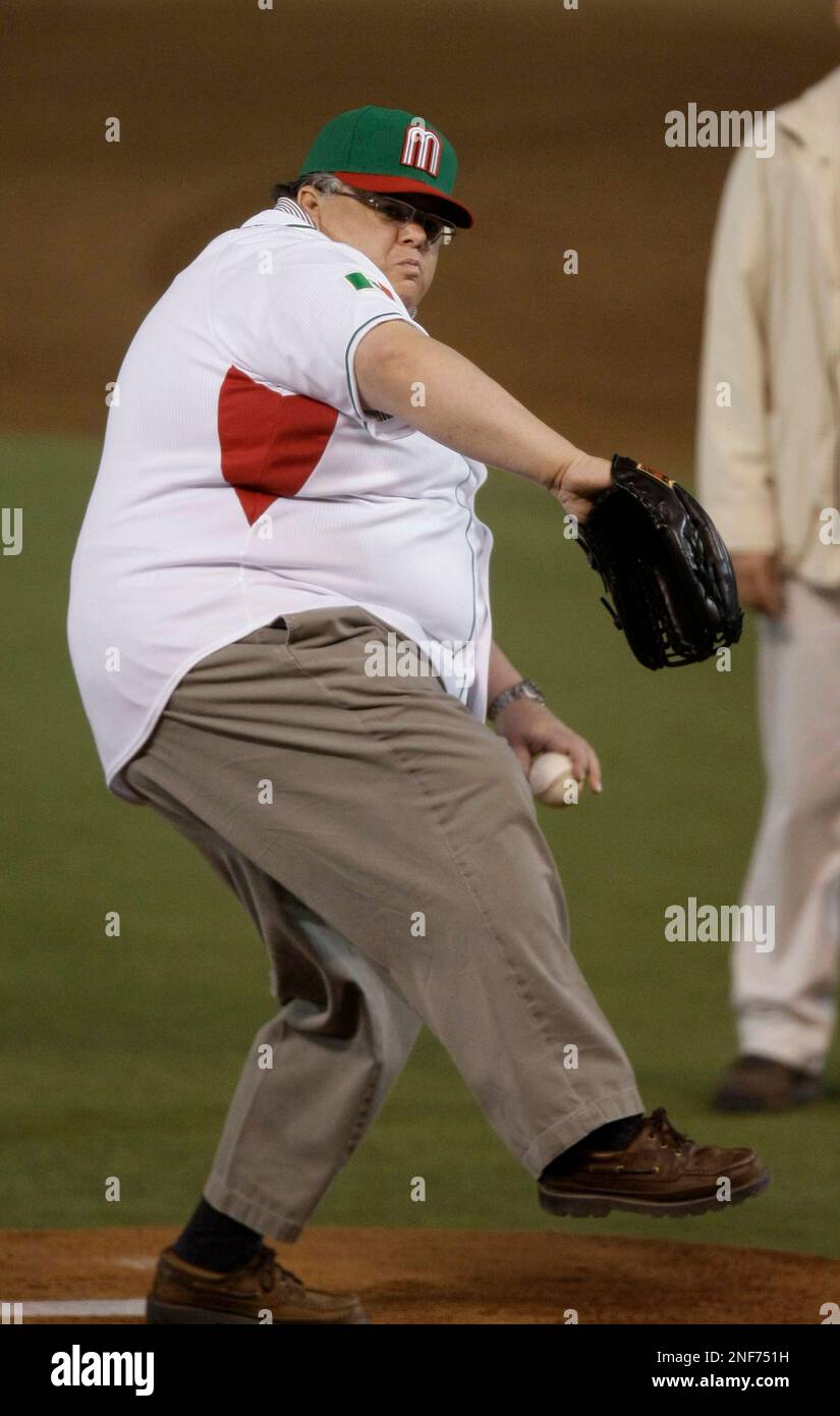 Mexico's Finance Secretary Augustin Carstens throws the first pitch ...