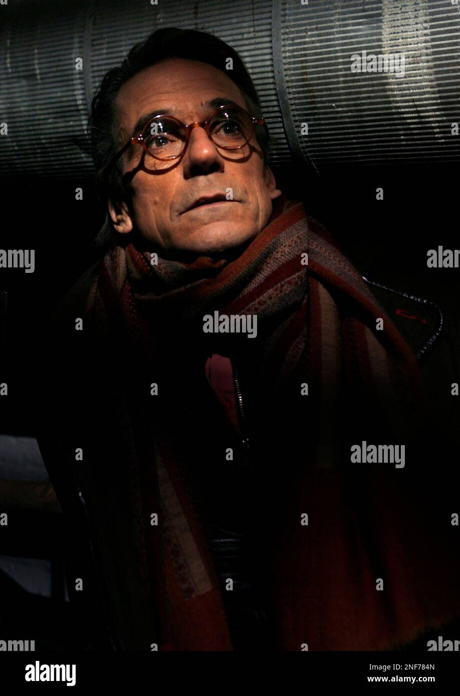 Actor Jeremy Irons poses for a picture in the alley next to the ...