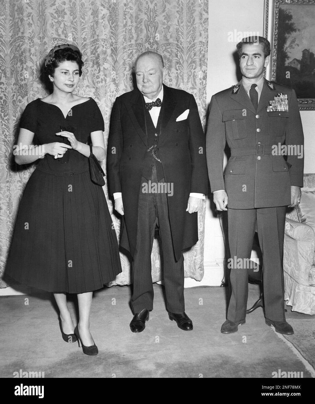 British premier sir Winston Churchill poses with the Shah and Queen ...