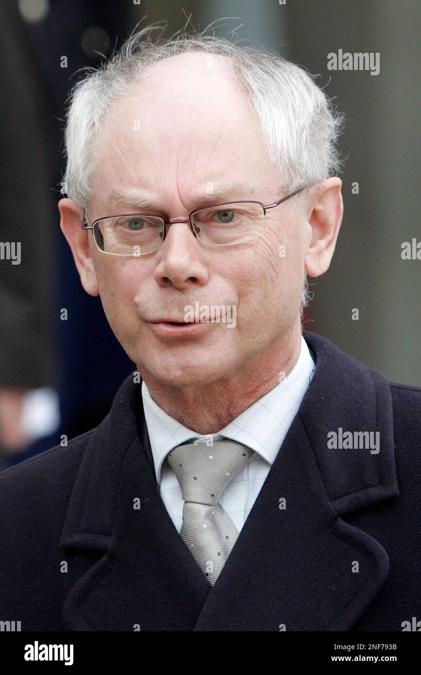 Belgian Premier Herman Van Rompuy addresses reporters following his ...