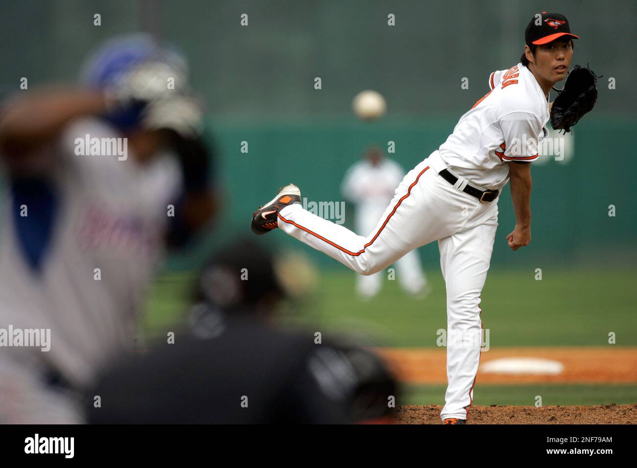Baltimore Orioles starting pitcher Koji Uehara, of Japan, throws during ...