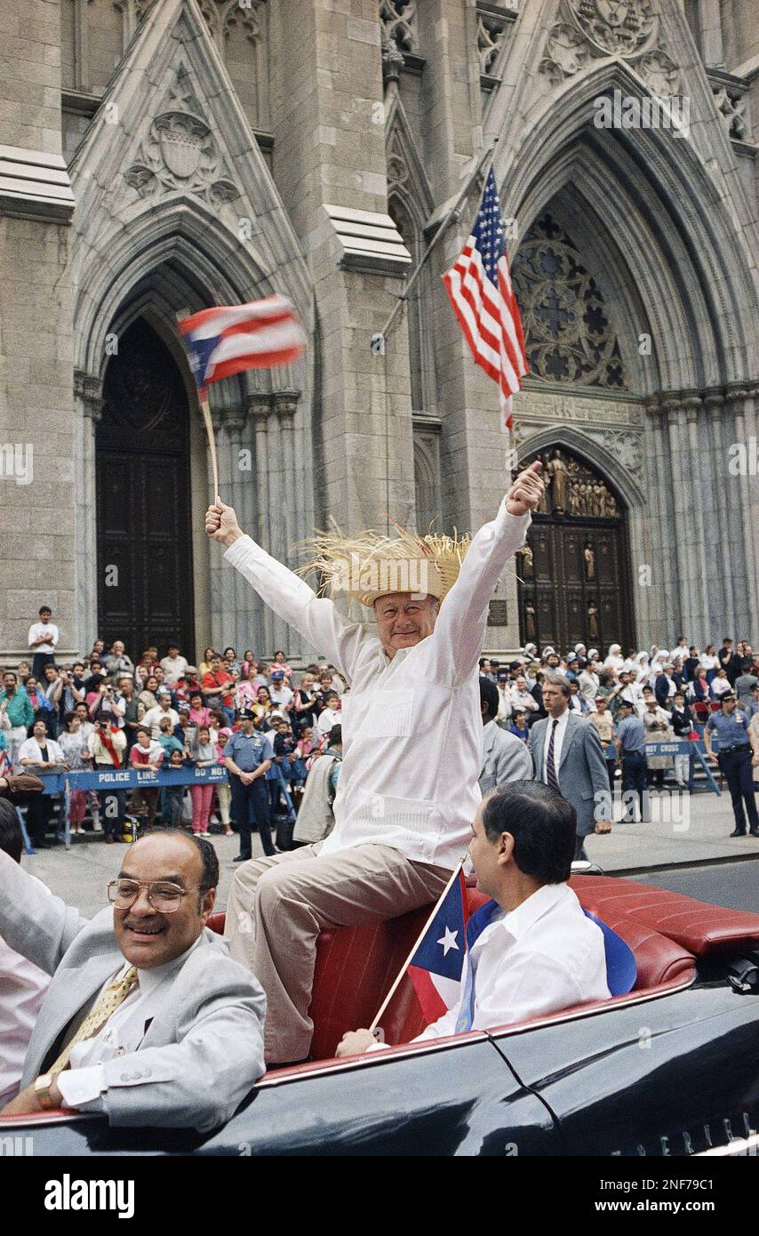 New York's Mayor Edward I. Koch waves his arms in the air on Sunday ...