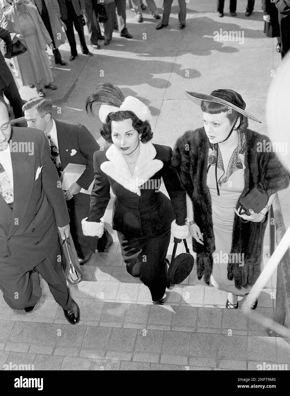 Robin Roberts, left, 23, a fashion model, leaves midtown court after ...