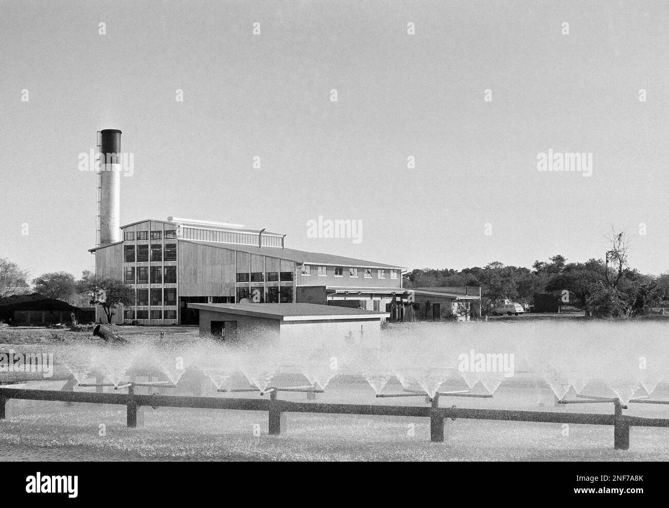 Towering over the new dusty capital of Gaborone, in Bechuanaland ...