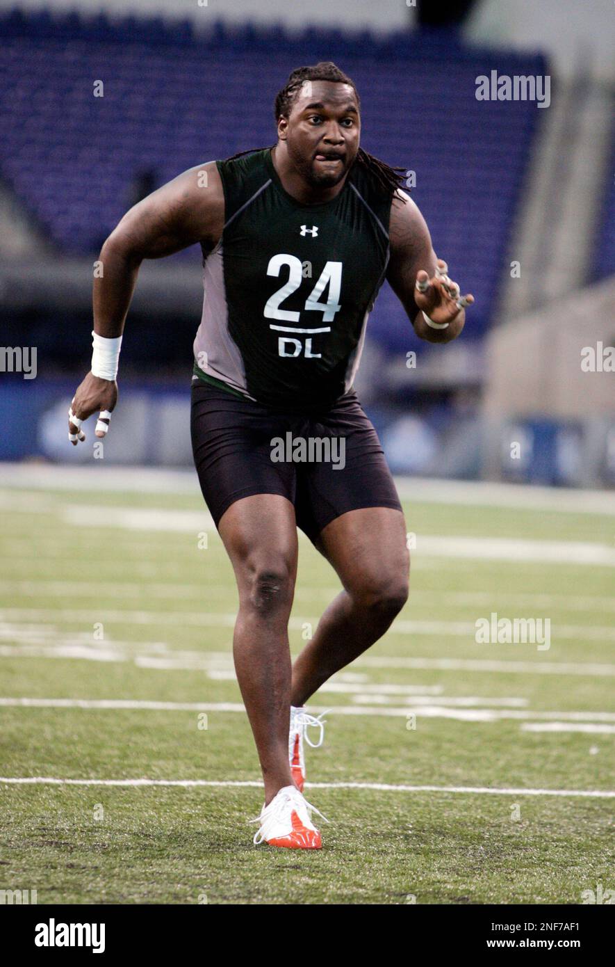 Louisiana State defensive lineman Tyson Jackson runs a football drill ...