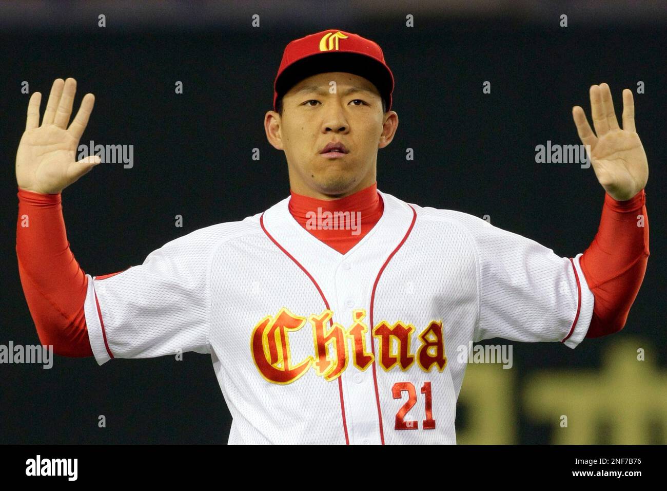 Team China shortstop Chang Ray of the Pittsburgh Pirates warms up for ...