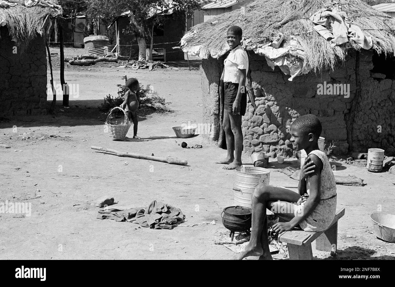 A stone's throw from luxury government buildings are these primitive ...