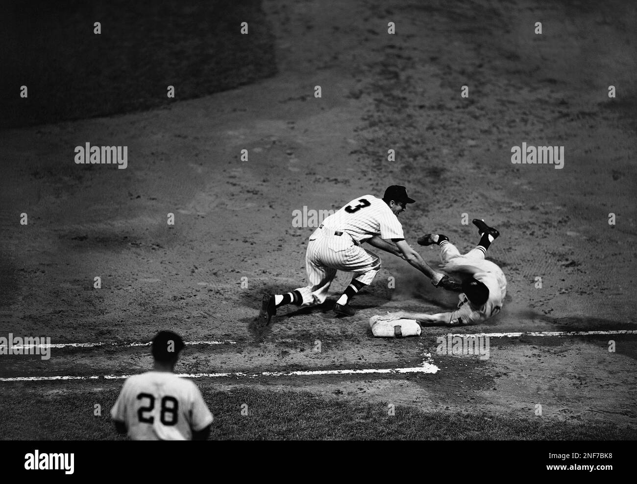 Jim Busby, Chicago White Sox center-fielder, makes a sprawling, diving ...