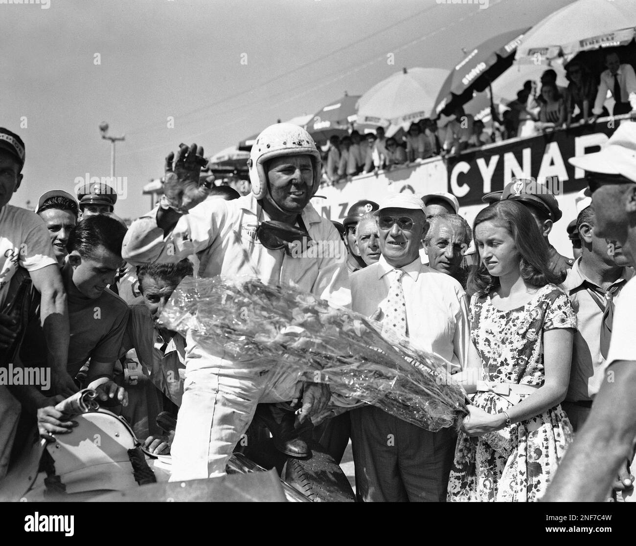 Jimmy Bryan, of Phoenix Arizona, U.S. National Champion, waving hand ...