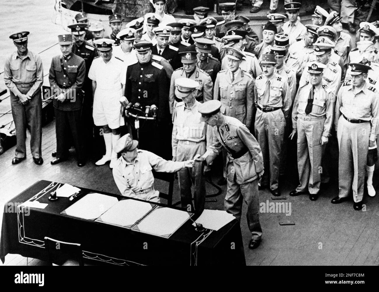 The Japanese surrender to Allied forces aboard the battleship USS ...