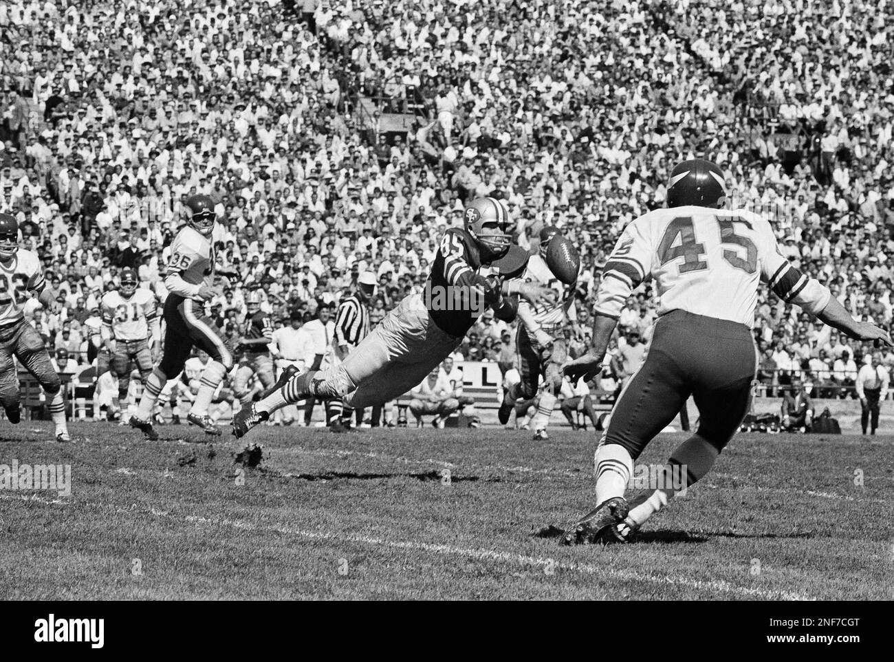 San Francisco 49er end Monty Stickles (85) gets arms crossed and ...
