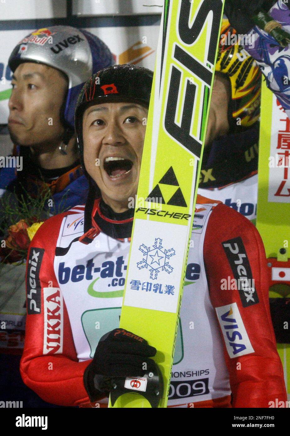 Japan's bronze medal winner Takanobu Okabe reacts after the Men's Team ...