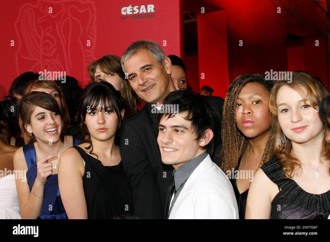 French director Laurent Cantet, center background, and some of the ...