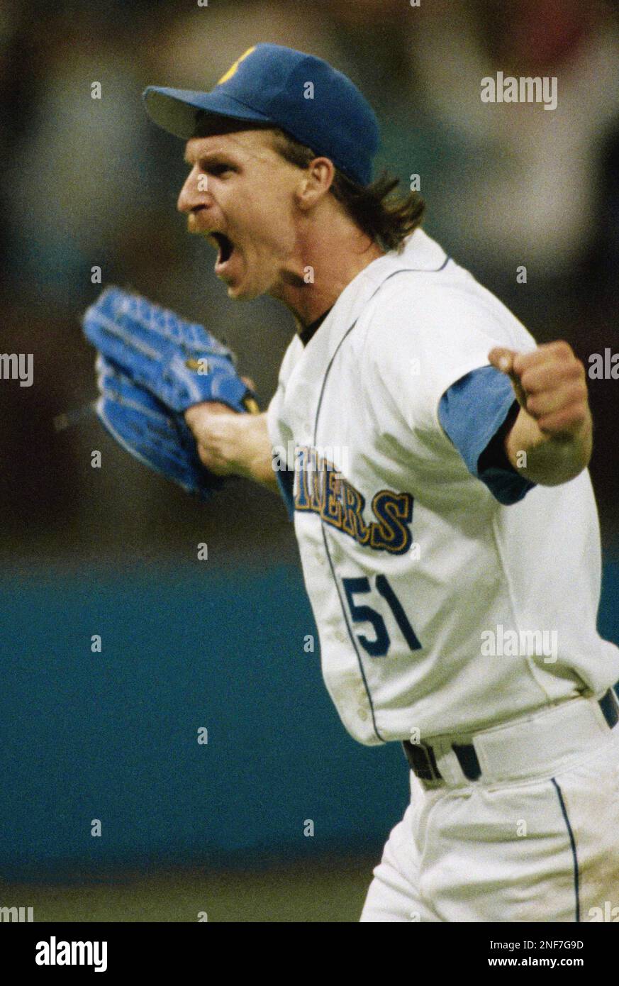 Seattle Mariners winning pitcher Randy Johnson lets out a holler after ...