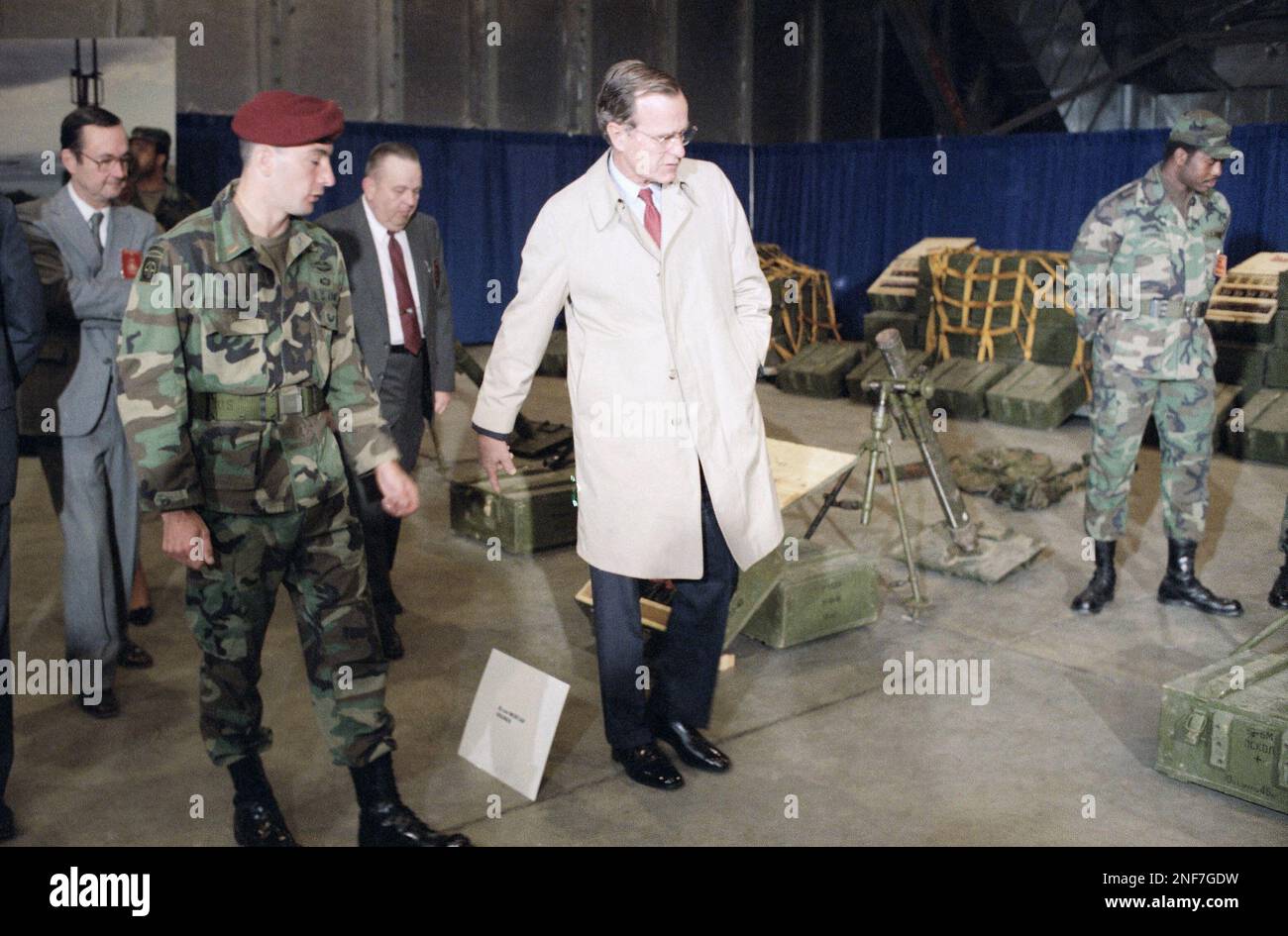 U.S. Vice-President George H. Bush shown talking to U.S. troops ...