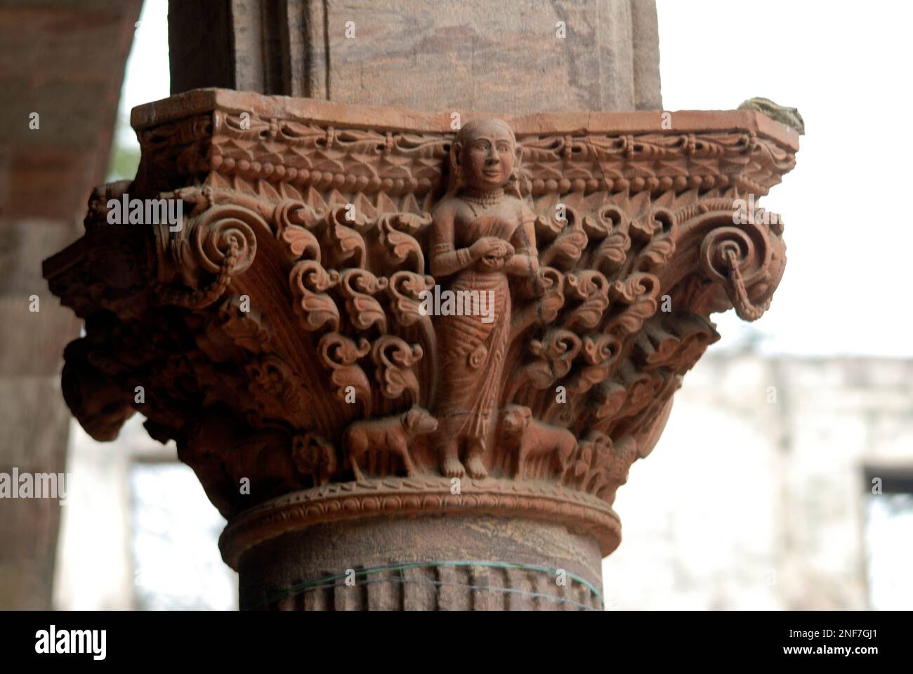 Relief art work of a women on decorative piller of old palace of Indore ...