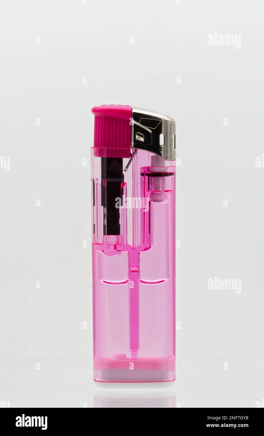 Pink transparent lighter isolated on white background Stock Photo - Alamy