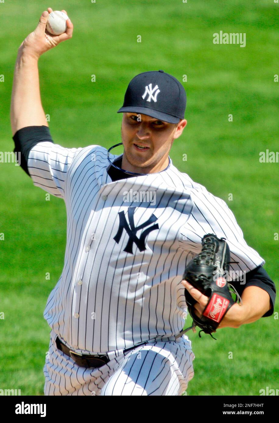 New York Yankees pitcher Phil Hughes throws agianst the Tampa Bay Rays ...
