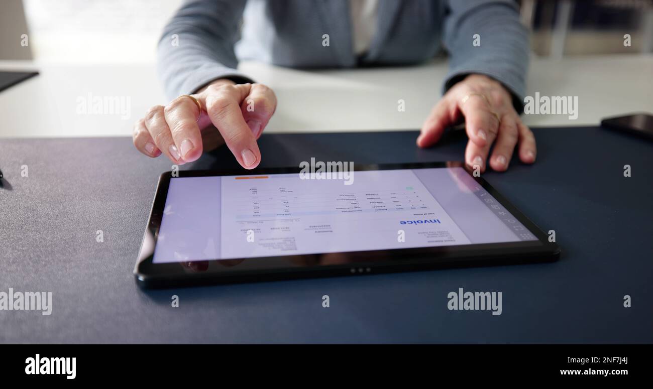 Digital Electronic Bill And Accountant E Invoice On Tablet Stock Photo ...