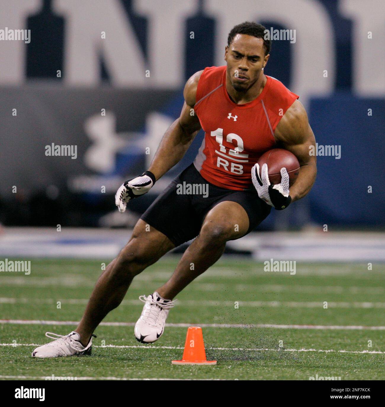 Liberty running back Rashad Jennings runs a drill at the NFL Scouting ...