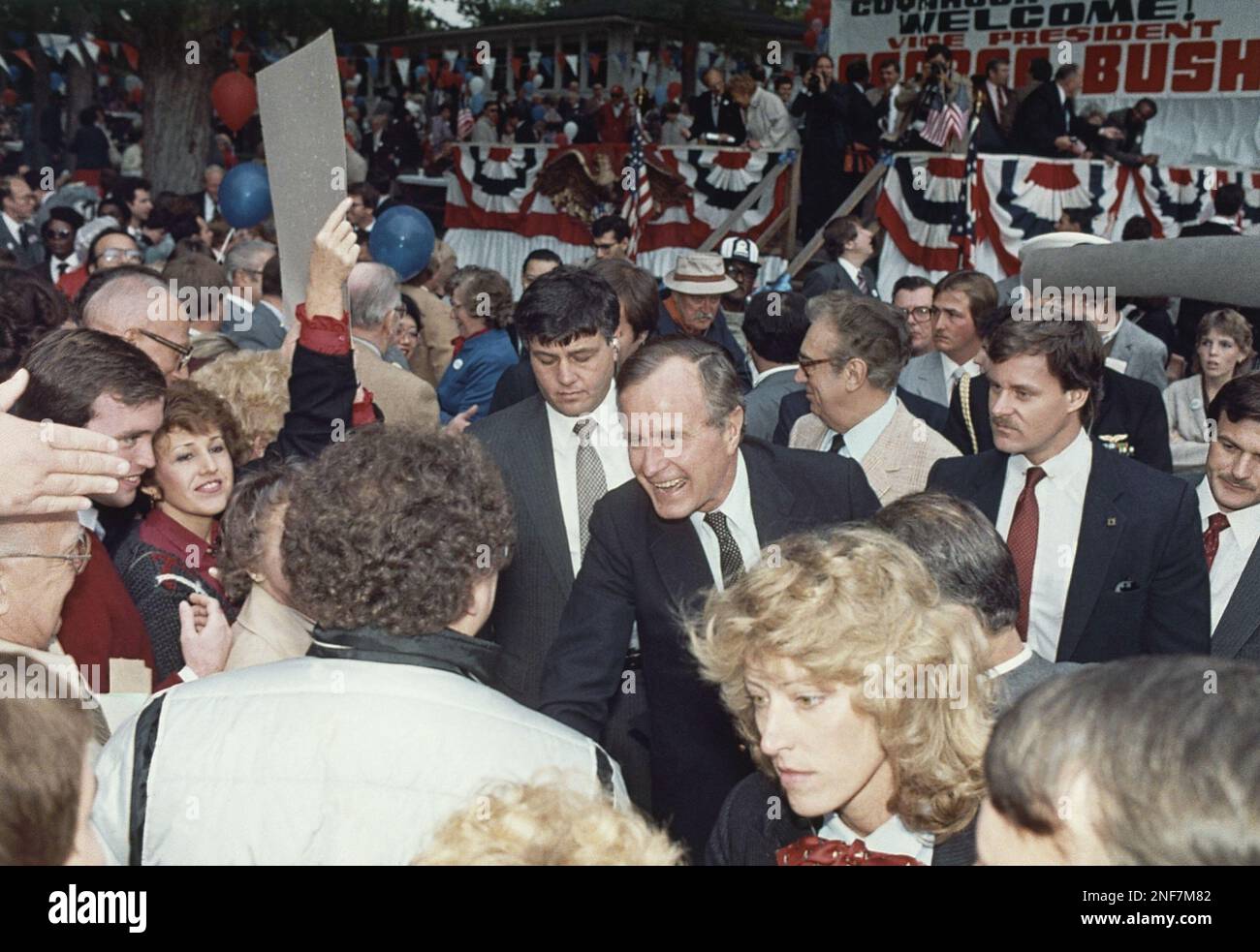 U.S. Vice-President George H. Bush shown with supporters, Oct. 2, 1984 ...