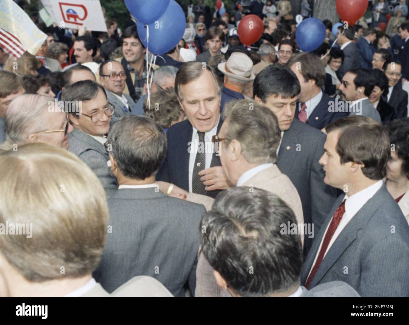 U.S. Vice-President George H. Bush shown with supporters, Oct. 2, 1984 ...
